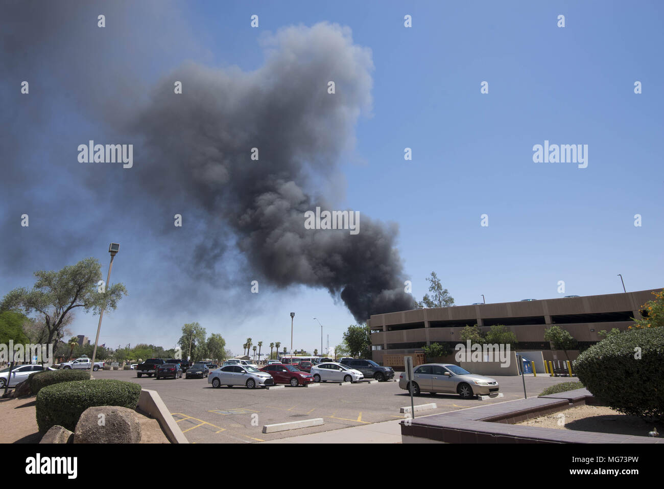 Phoenix, Arizona, USA. 27th Apr, 2018. Firefighters work the scene of a ...