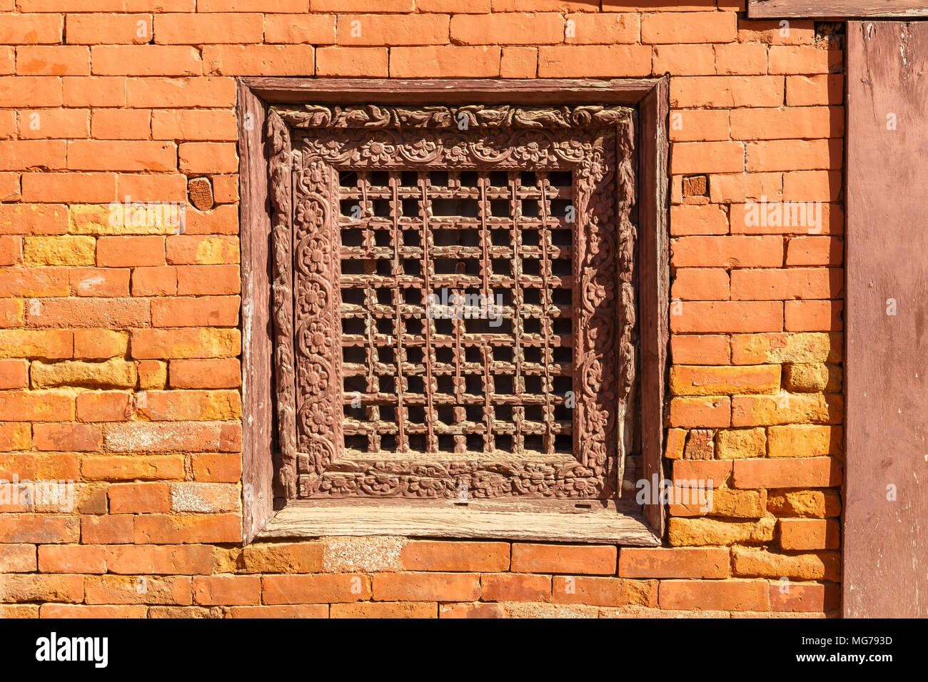Old wooden traditional Nepalese window in brick wall. Nepal Stock Photo ...