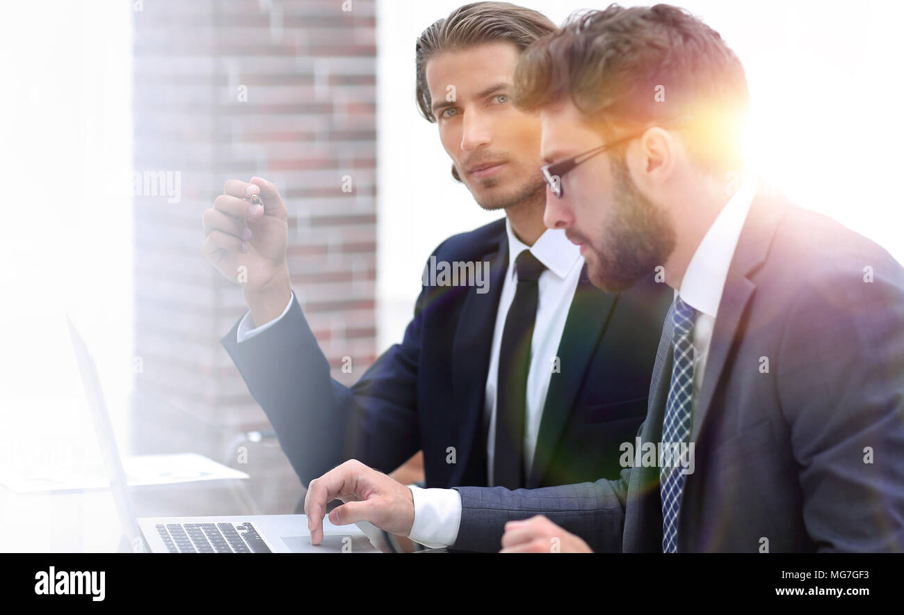 two clerks working at the Desk Stock Photo - Alamy