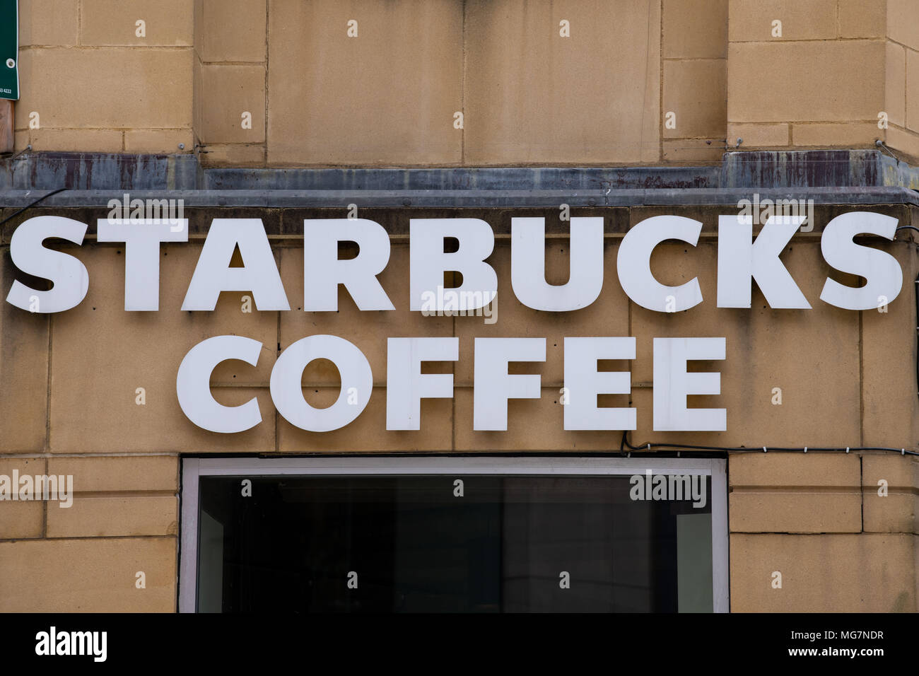 Starbucks coffee shop sign logo Stock Photo - Alamy