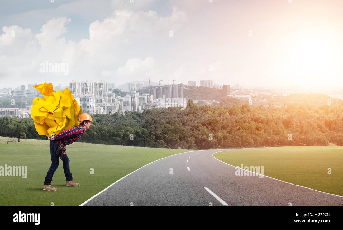 Engineer man carry load Stock Photo - Alamy