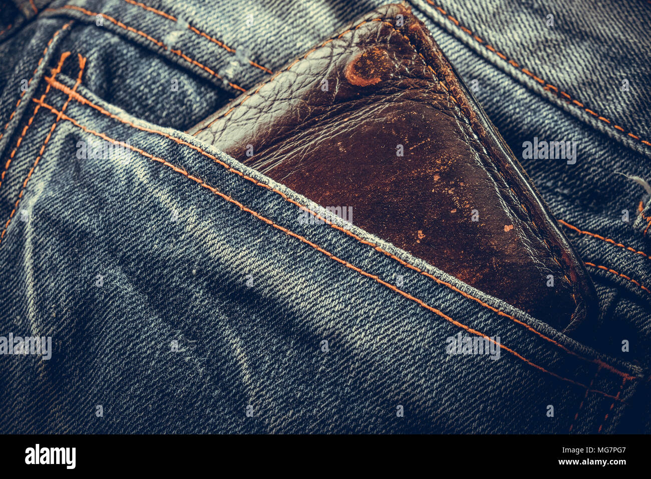 wallet and jean with filter effect retro vintage style Stock Photo - Alamy