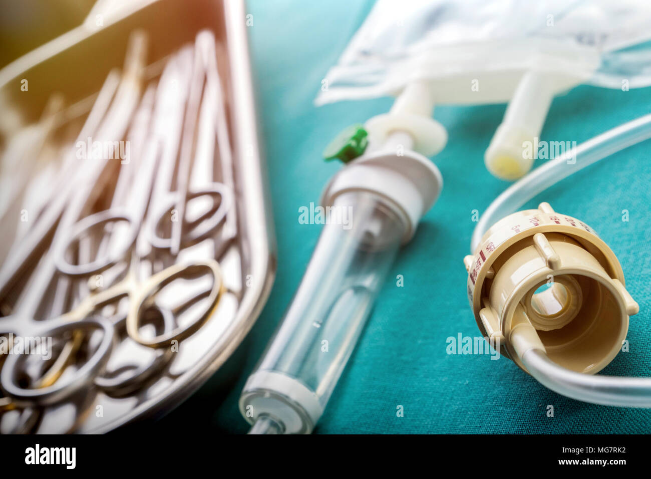 Dial flow next to a syringe at a hospital table, conceptual image Stock ...