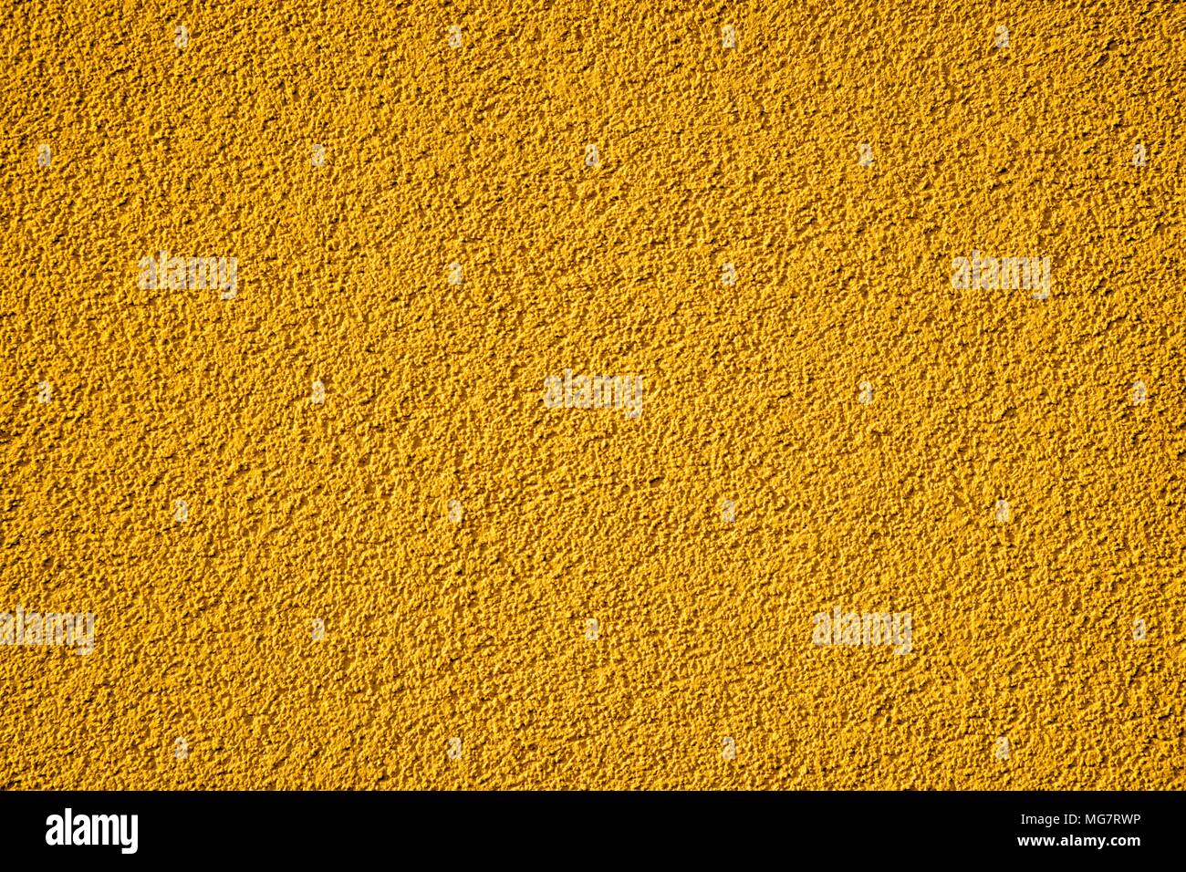 Concrete texture wall texture, cement Ultra yellow colored background ...
