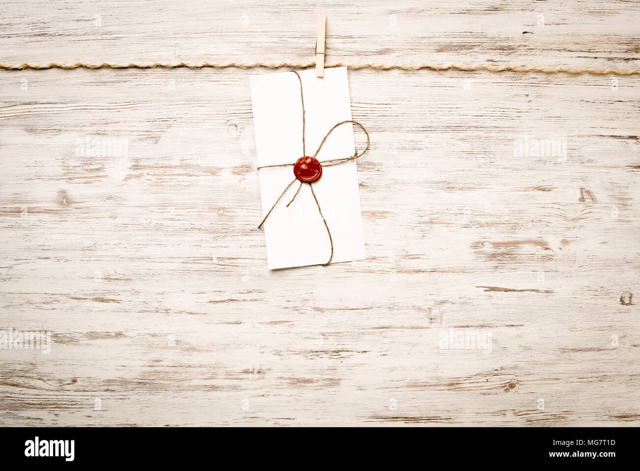 Mail envelope on rope Stock Photo - Alamy