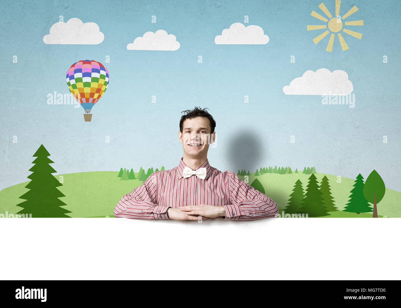 Cheerful man with banner Stock Photo - Alamy