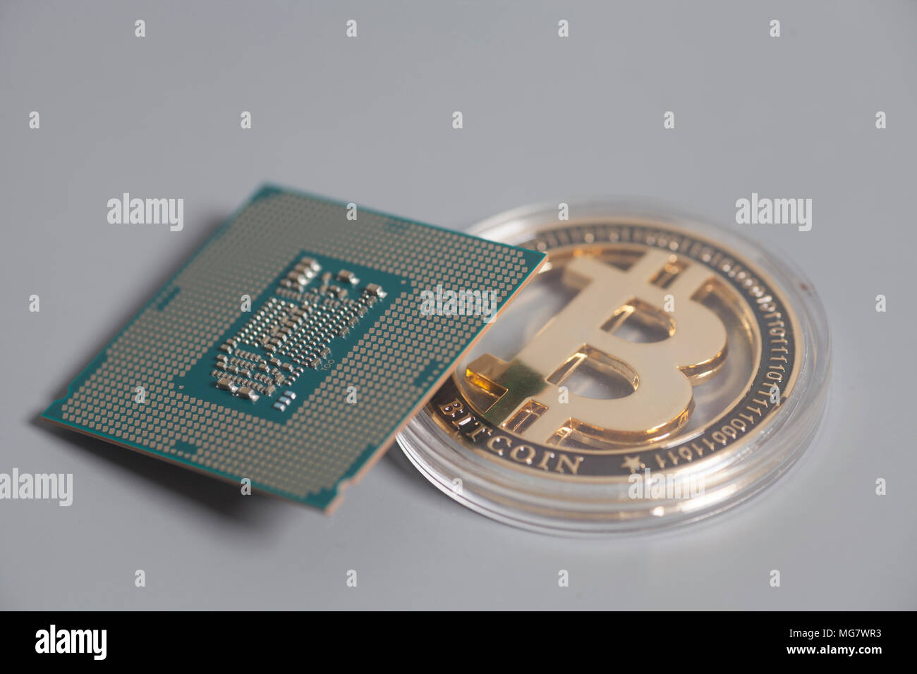 Central processing unit CPU microchip with Bitcoins on gray Stock Photo ...