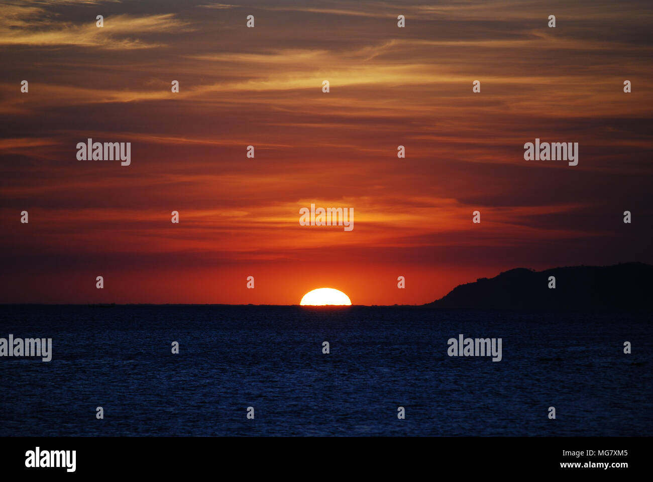 A sunset bliss at the beach Stock Photo - Alamy