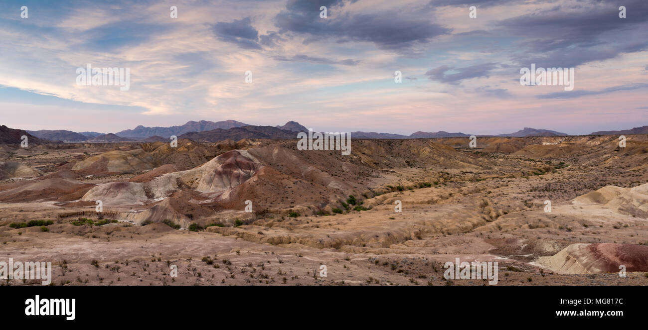 Panoramic view of Badlands in late afternoon sunlight showing hills and ...