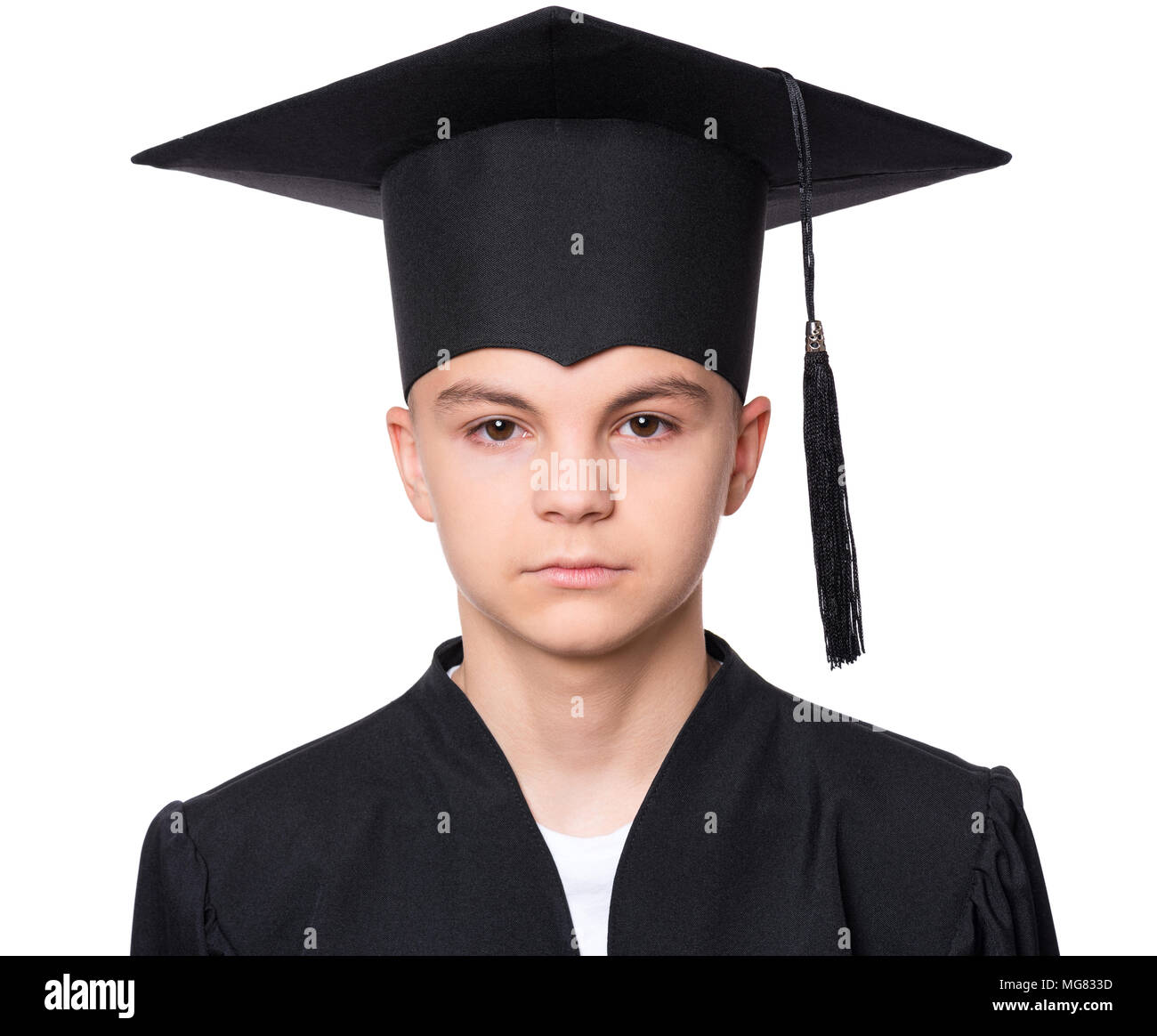 Close up portrait of graduate teen boy student in black graduation gown ...