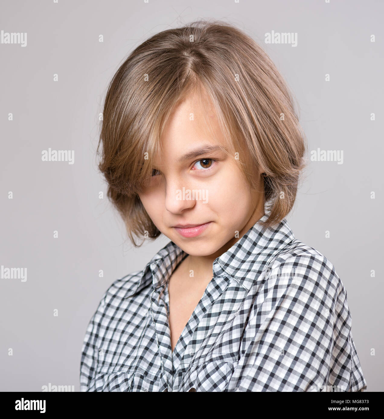 Coy kid hi-res stock photography and images - Alamy