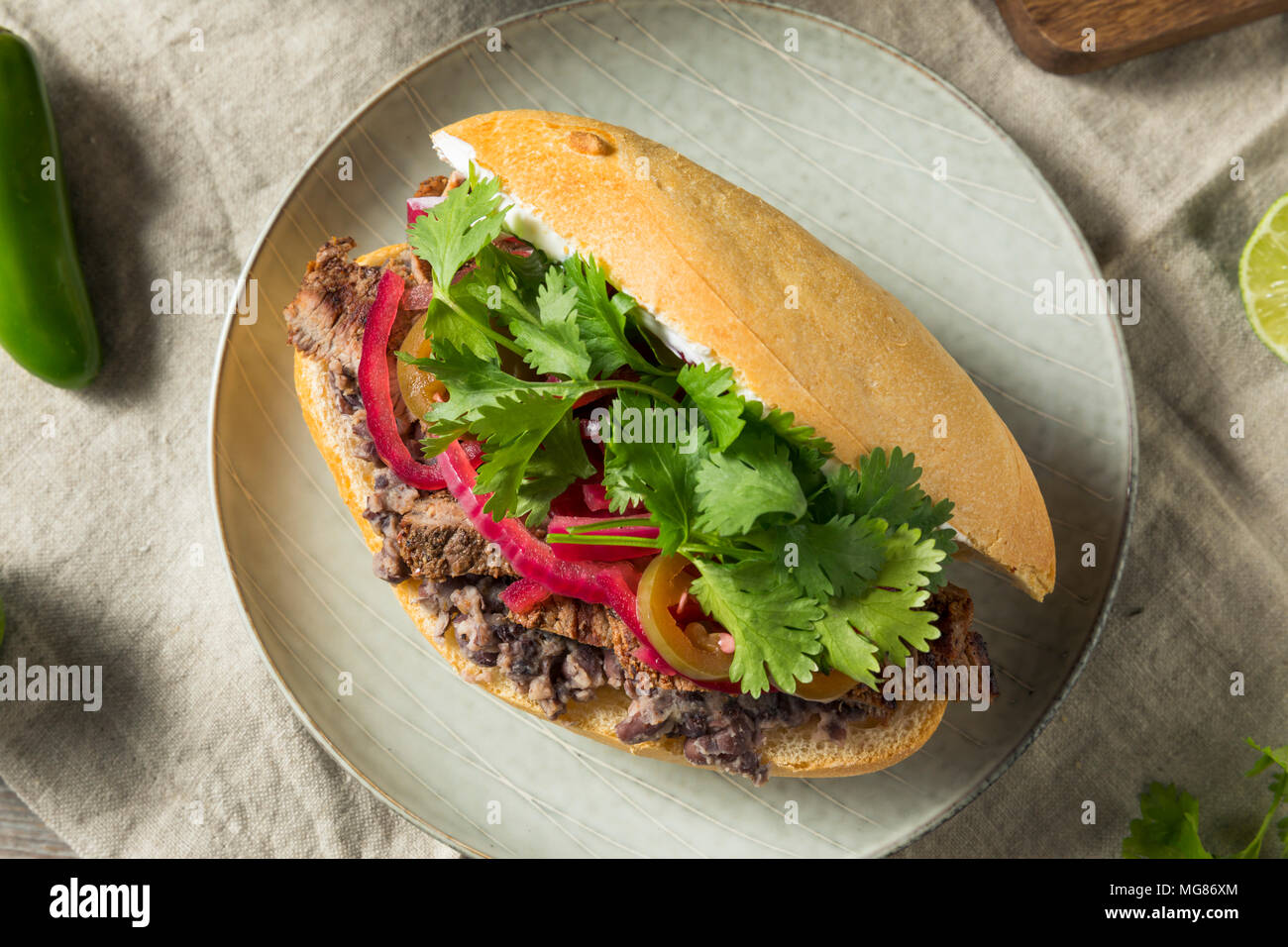 Homemade Mexican Beef Torta Sandwich with Cilantro and Jalapenos Stock ...