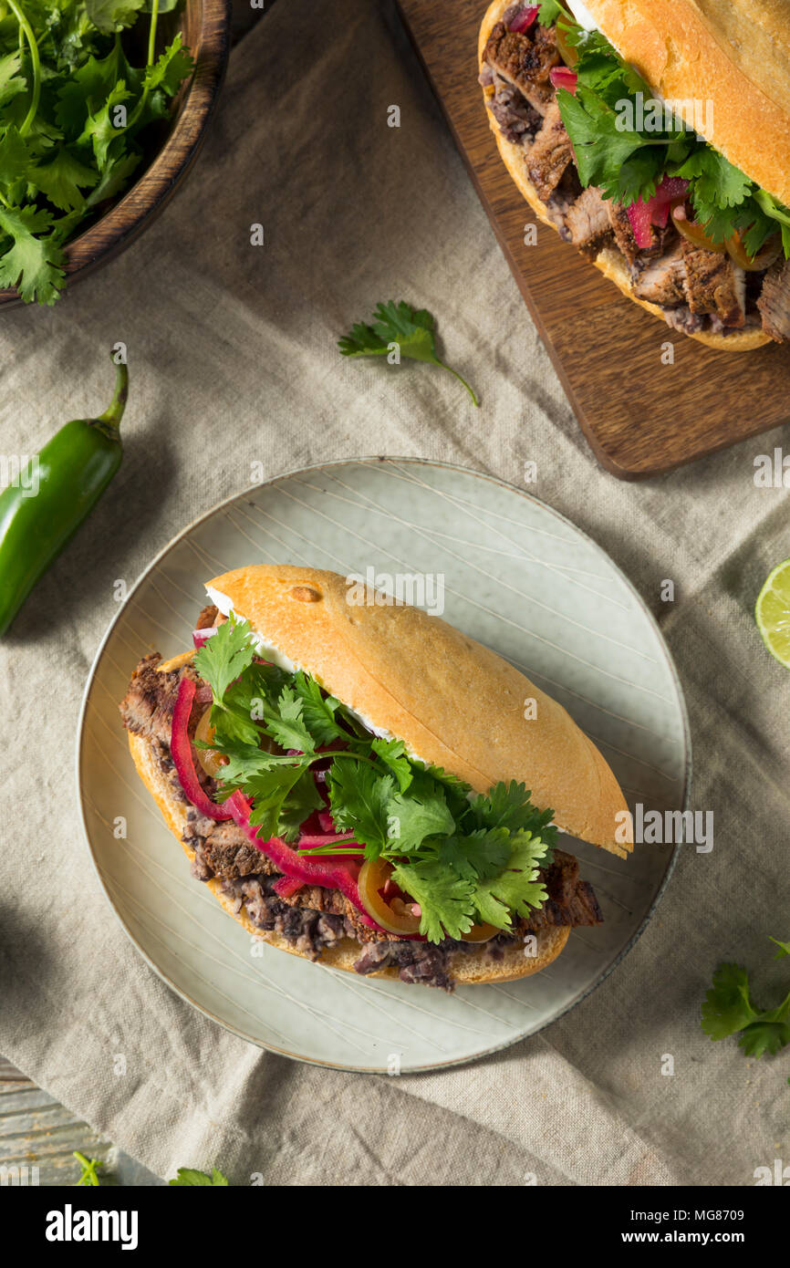 Homemade Mexican Beef Torta Sandwich with Cilantro and Jalapenos Stock ...