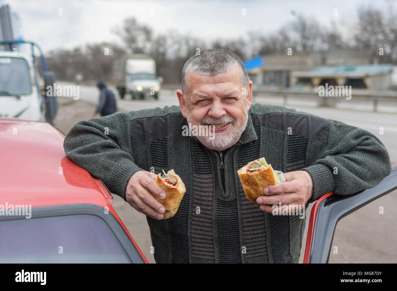 Fat man eating kebab hi-res stock photography and images - Alamy