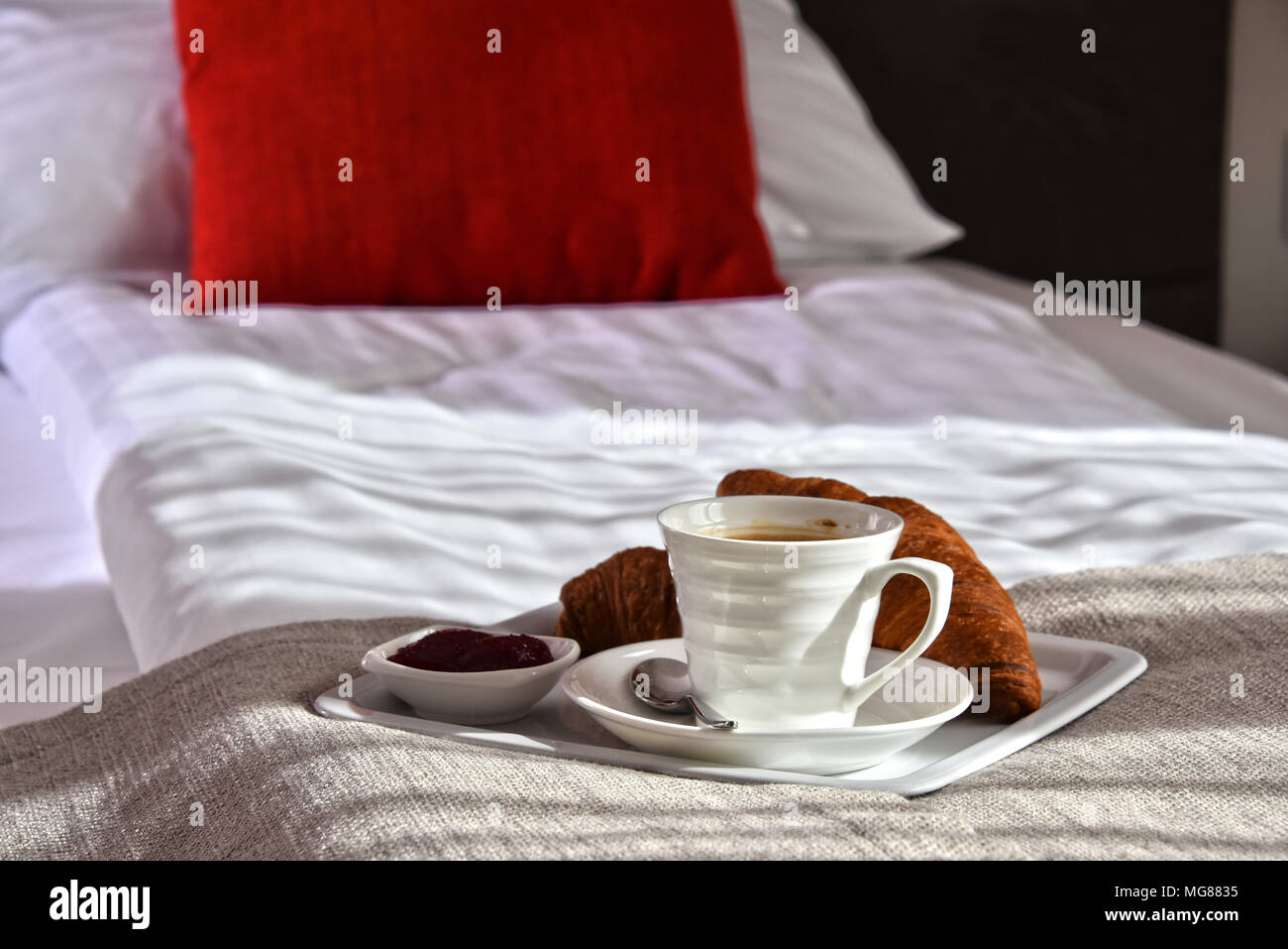 Breakfast in bed in hotel room Stock Photo - Alamy