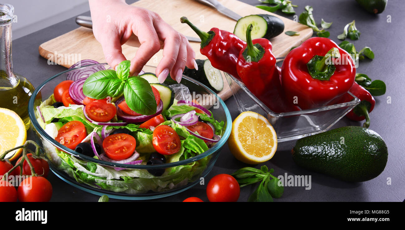 Preparation of a vegetable salad from fresh organic ingredients Stock ...