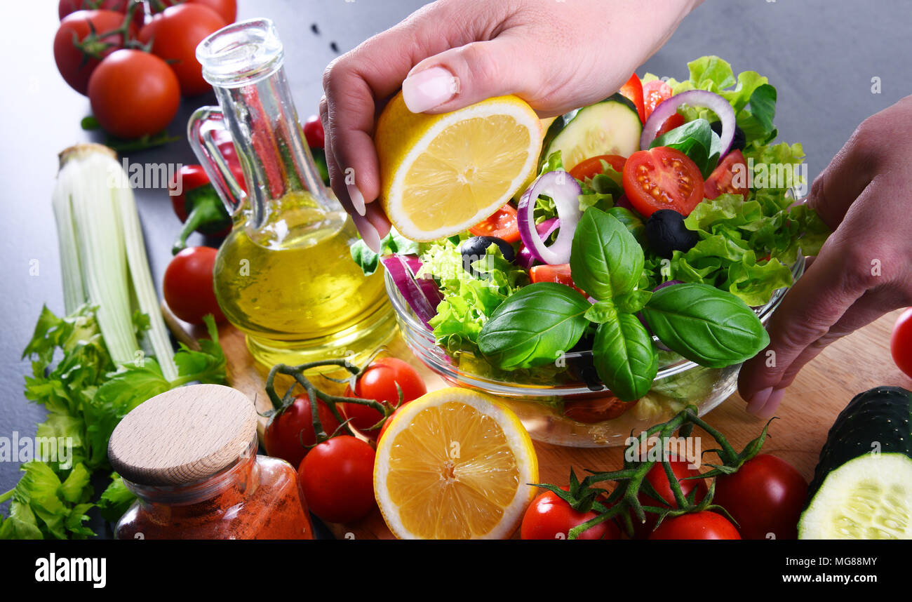 Preparation of a vegetable salad from fresh organic ingredients Stock ...