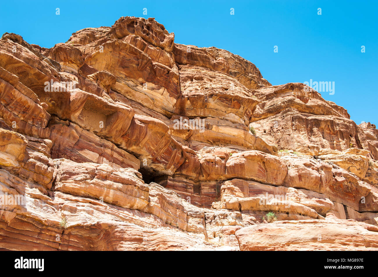 Red sandstone rocks in Petra (Rose City), Jordan. The city of Petra was ...
