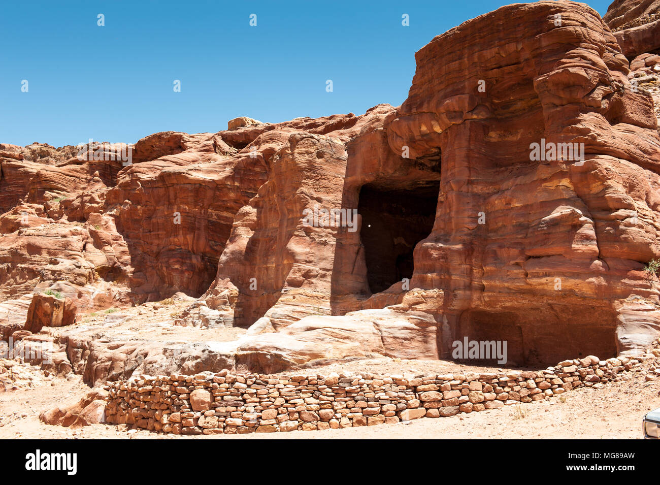 Red sandstone rocks in Petra (Rose City), Jordan. The city of Petra was ...
