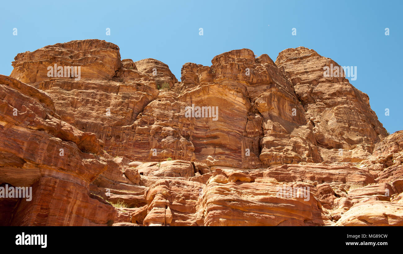 Red sandstone rocks in Petra (Rose City), Jordan. The city of Petra was ...