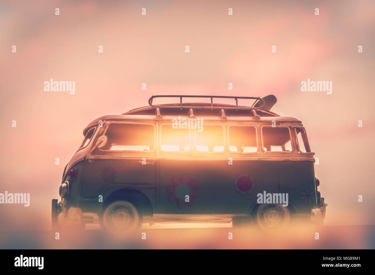 Campervan on sunset, penetrating rays of the sun through the windows of ...