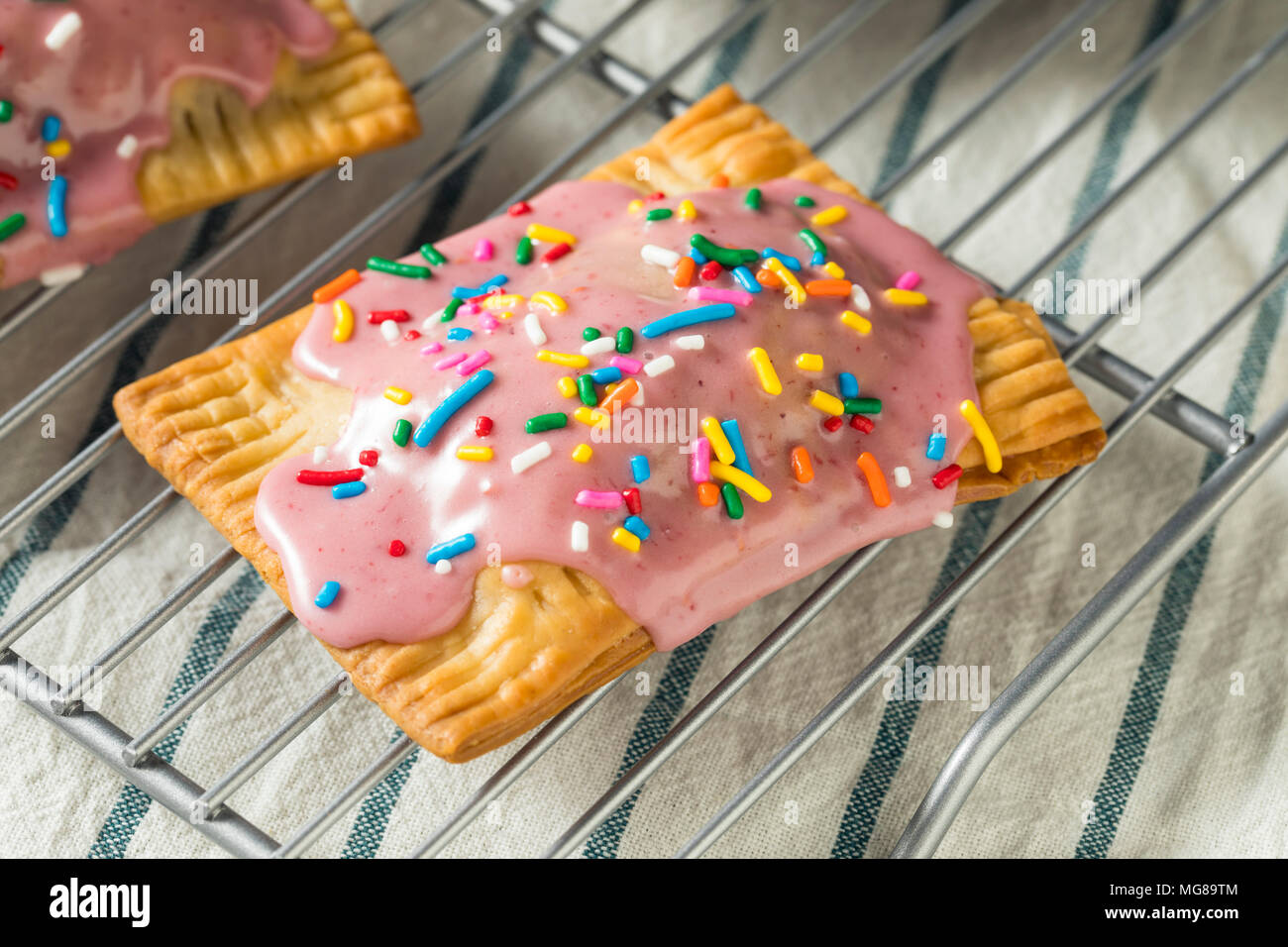 Sweet Homemade Strawberry Toaster Pastries with Sprinkles Stock Photo ...