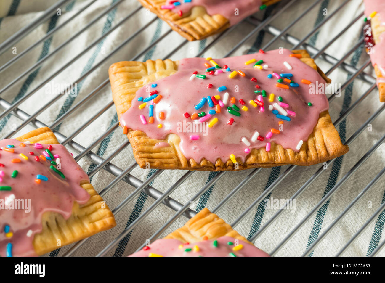 Sweet Homemade Strawberry Toaster Pastries with Sprinkles Stock Photo ...
