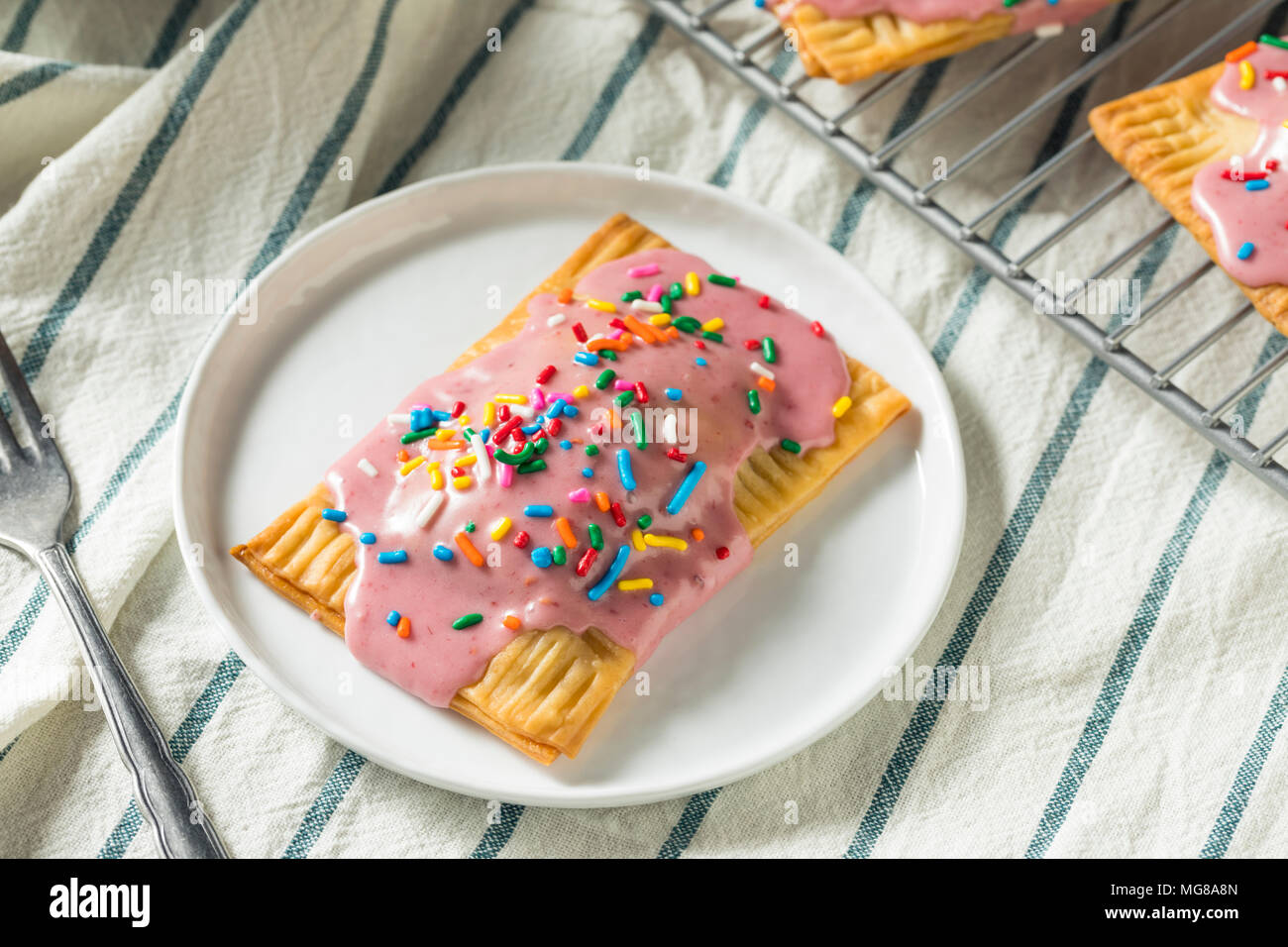 Sweet Homemade Strawberry Toaster Pastries with Sprinkles Stock Photo ...