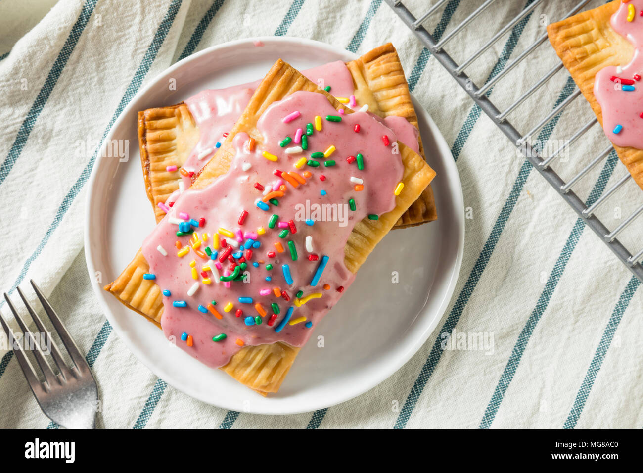 Sweet Homemade Strawberry Toaster Pastries with Sprinkles Stock Photo ...
