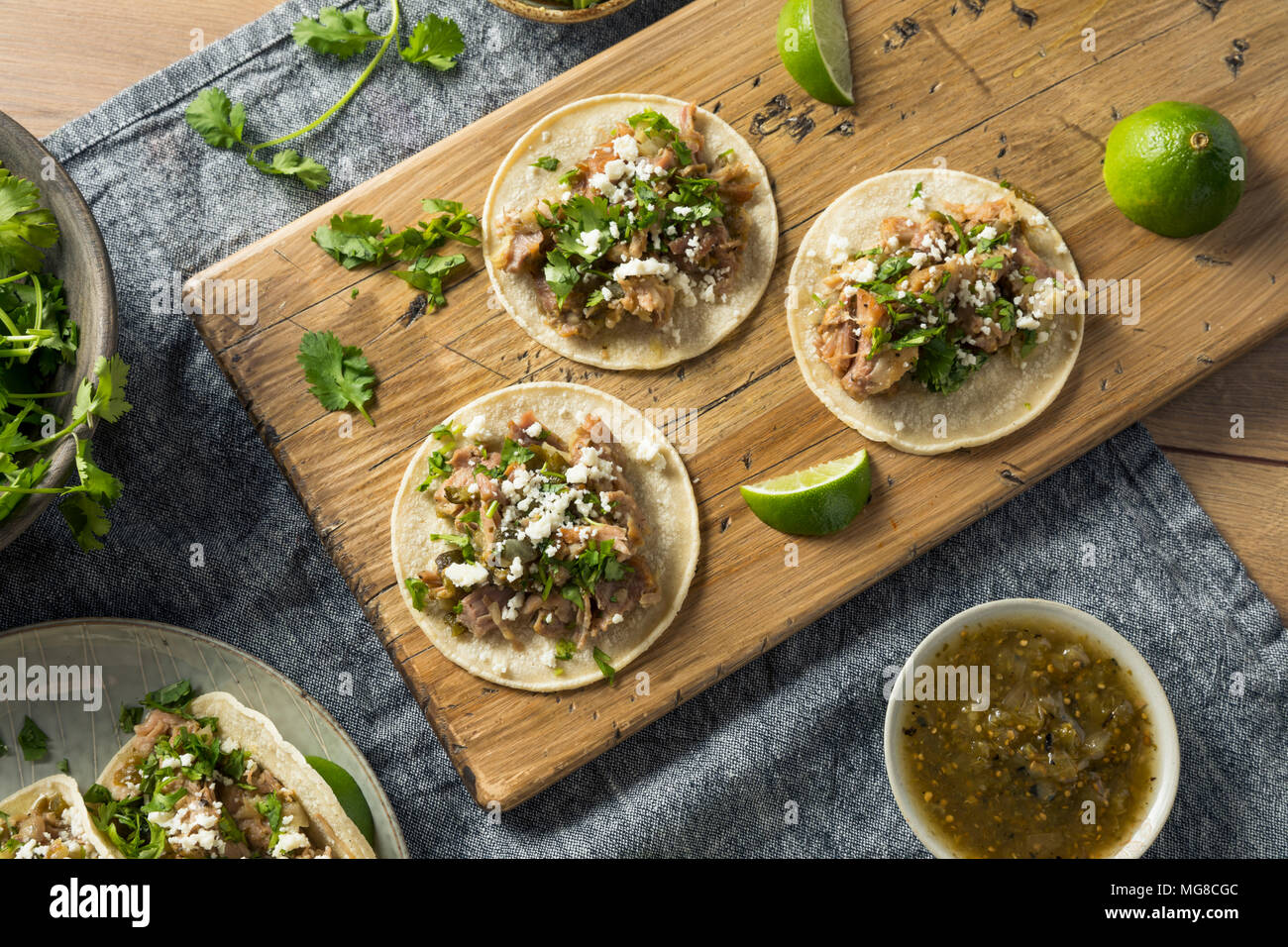 Homemade Pork Carnitas Tacos with Cilantro and Cojita Stock Photo - Alamy