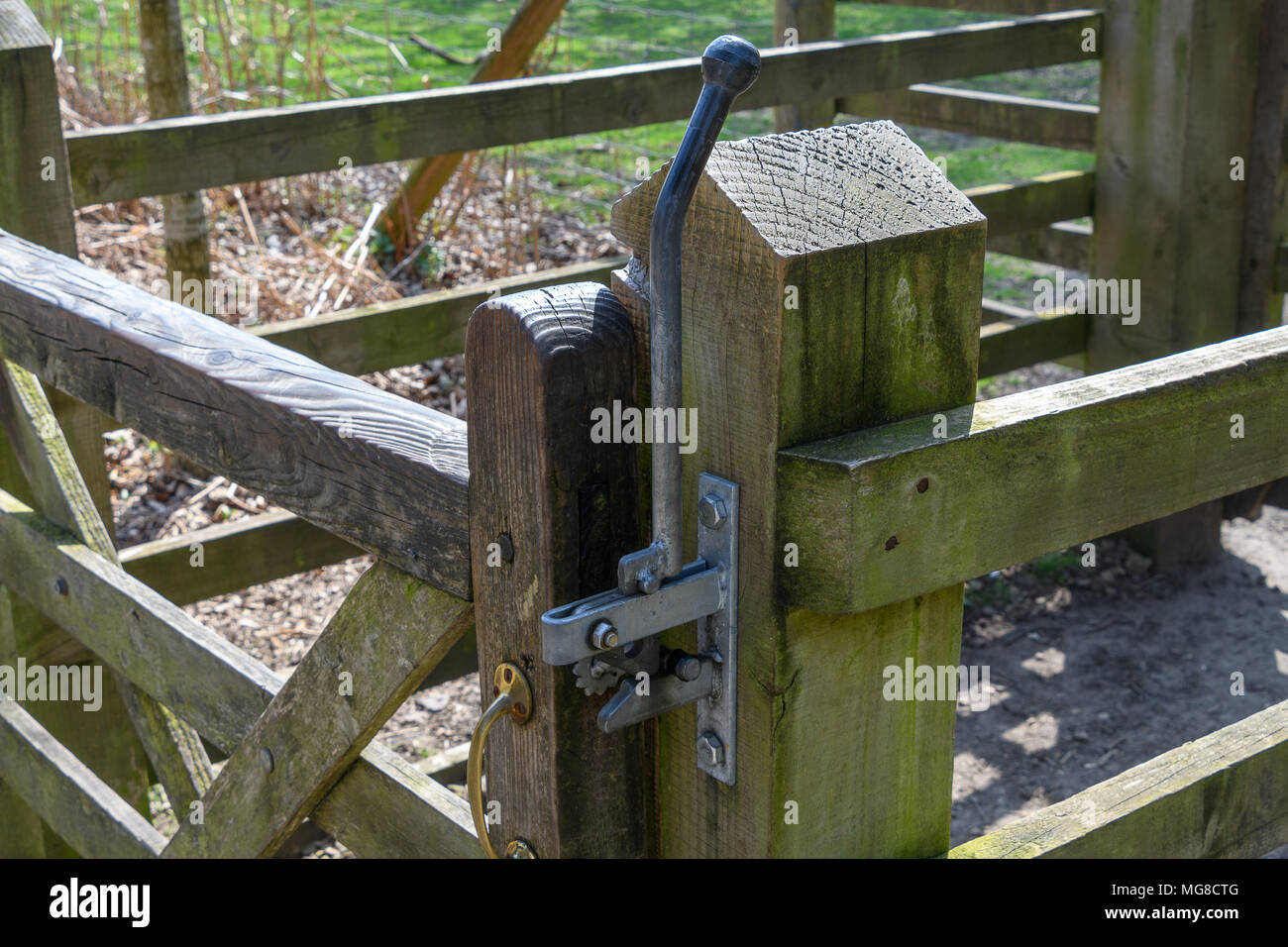 Wooden gate post metal gate hi-res stock photography and images - Alamy