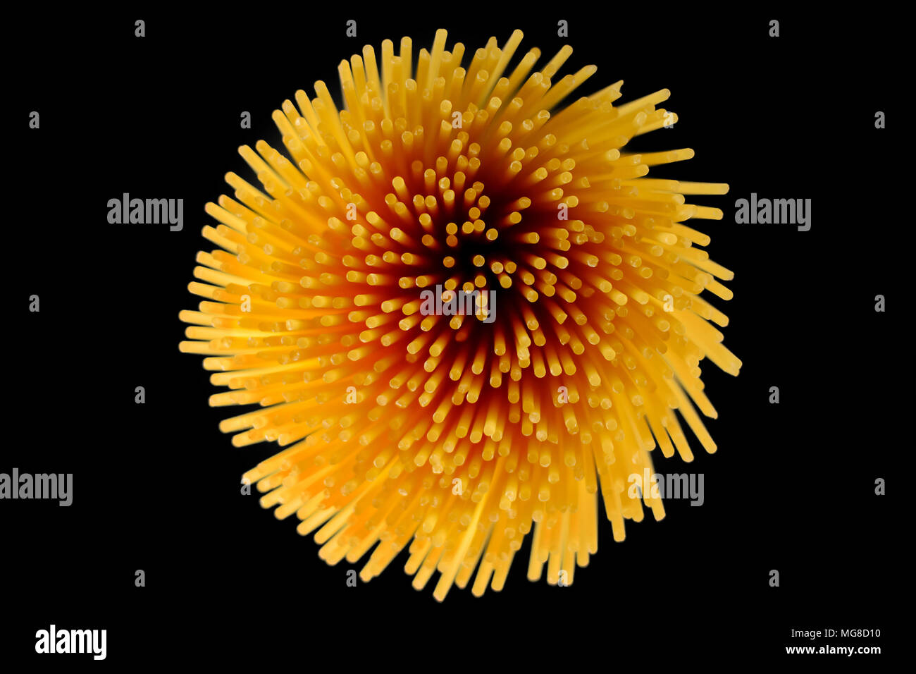 spaghetti in the form of fireworks on a black background isolate ...