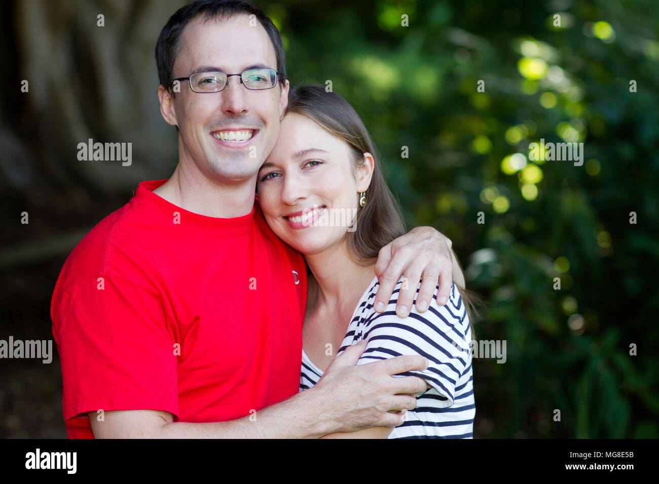 Embrace embracing hug hugging hi-res stock photography and images - Alamy