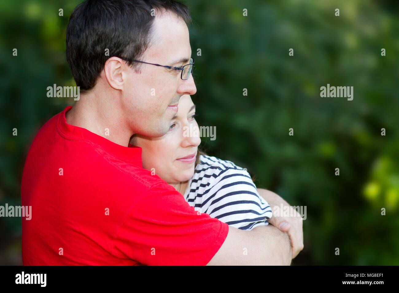 Loving couple hugging garden woman hi-res stock photography and images ...