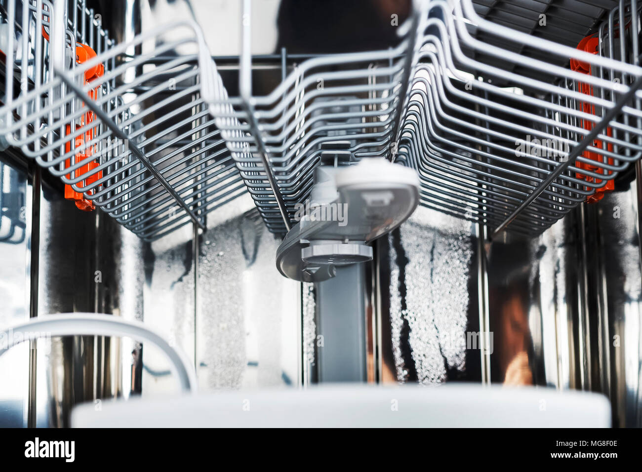 Dishwasher mana machine after washing dishes from the inside. Upper ...