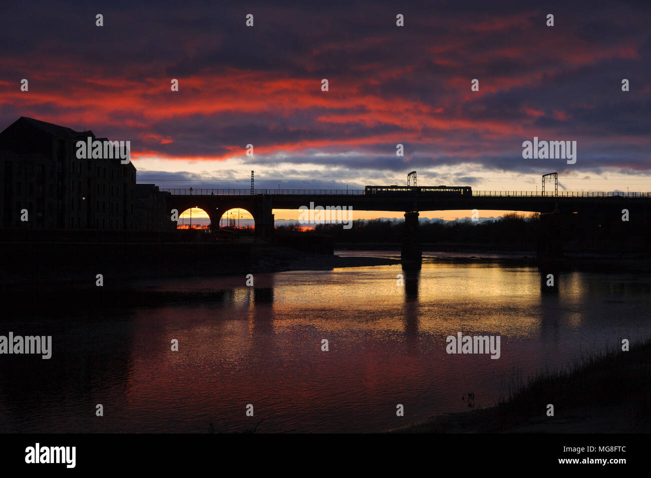Northern rail class 142 pacer train crossing Carlisle bridge, Lancaster ...