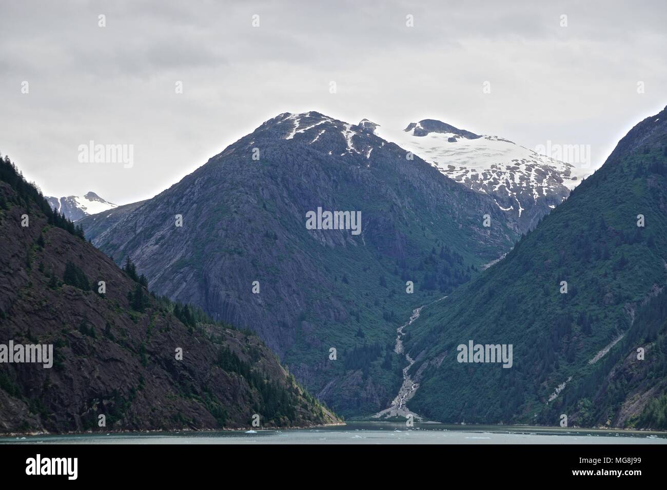 Endicott Arm, Alaska, USA: A waterfall in a fjord in the Pacific ...