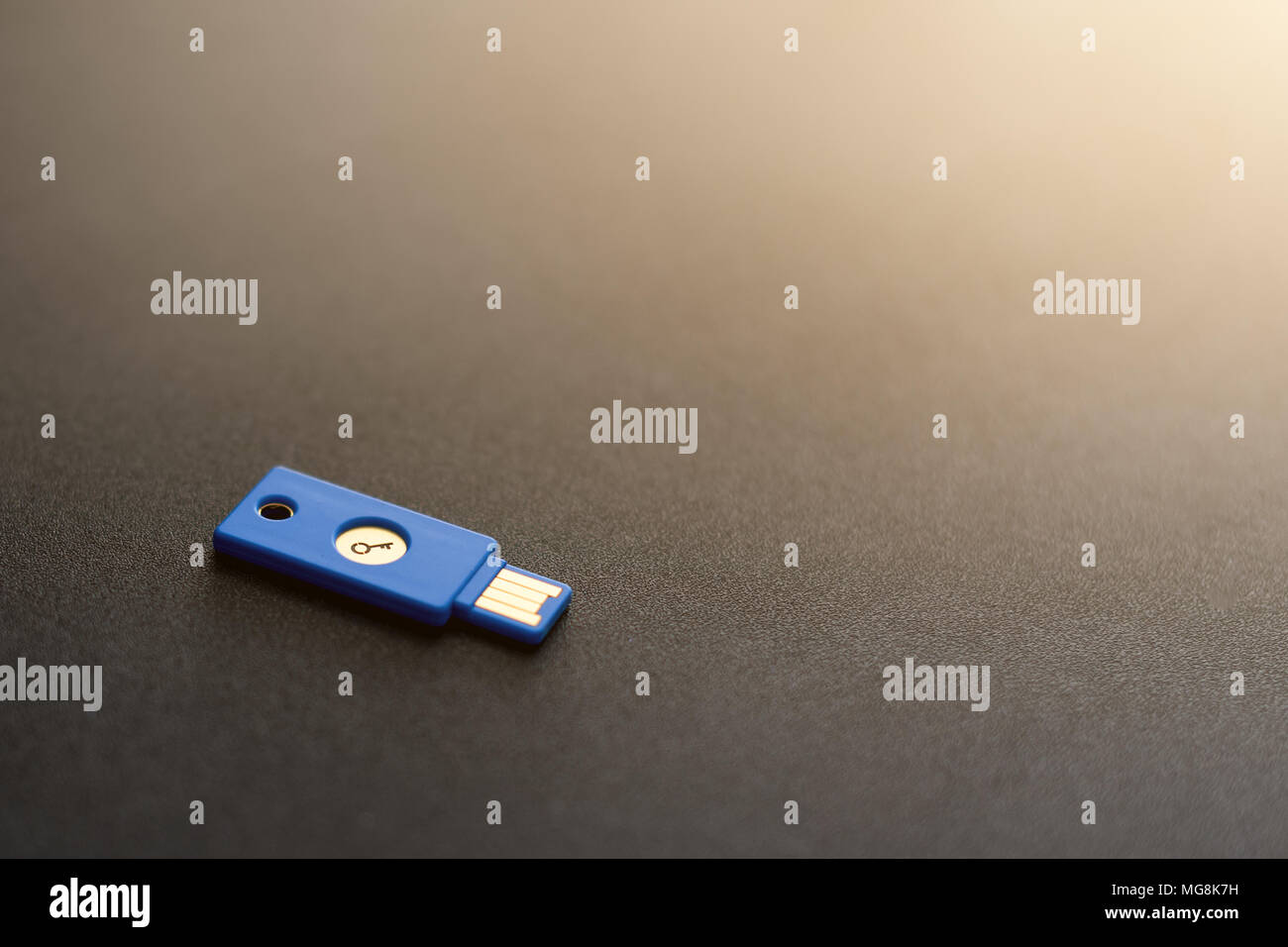 Security system concept. Key-shaped USB drive on dark background ...