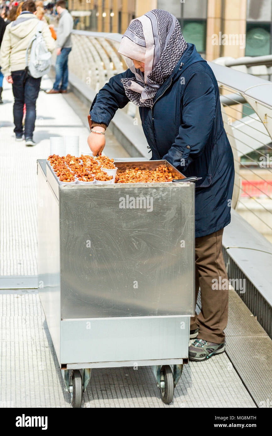 Street vendor selling roasted nuts hi-res stock photography and images ...