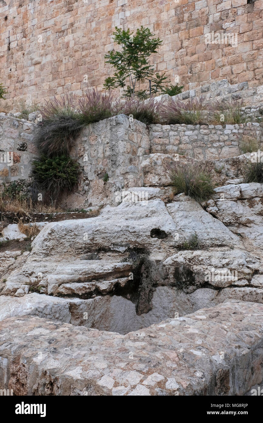 Remains of medieval wall and rock cut tombs located at the Ottoman ...
