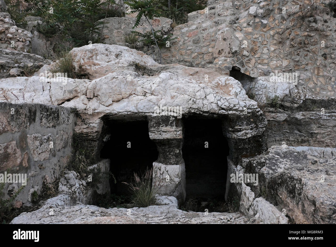 Remains of medieval wall and rock cut tombs located at the Ottoman ...