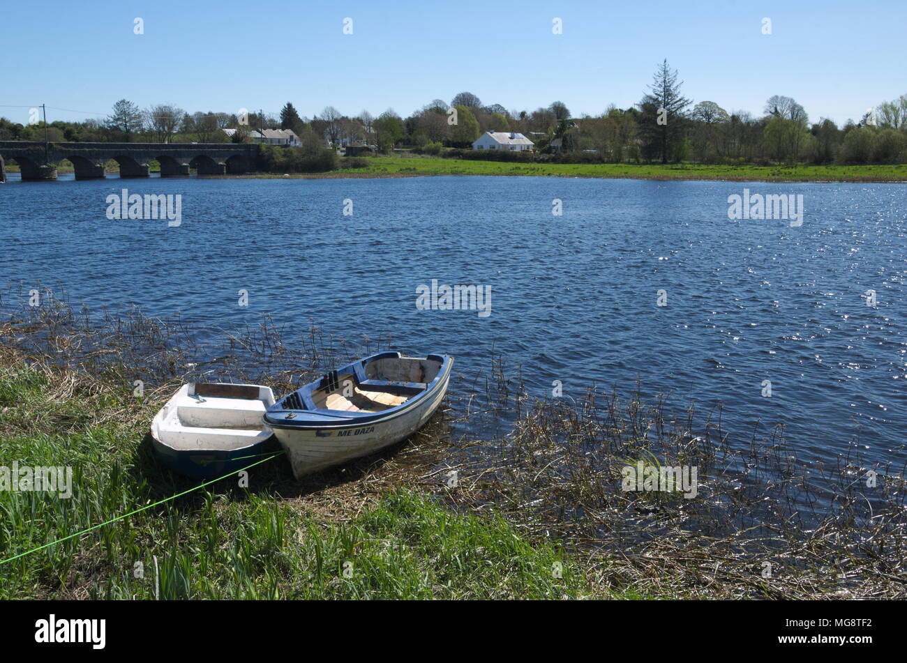 Two boats on a river Stock Photo - Alamy