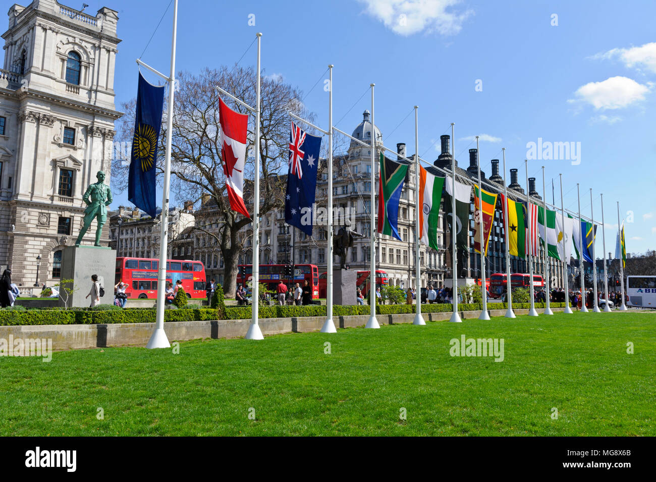 Flags of several nations on display in the Parliament Square, London ...