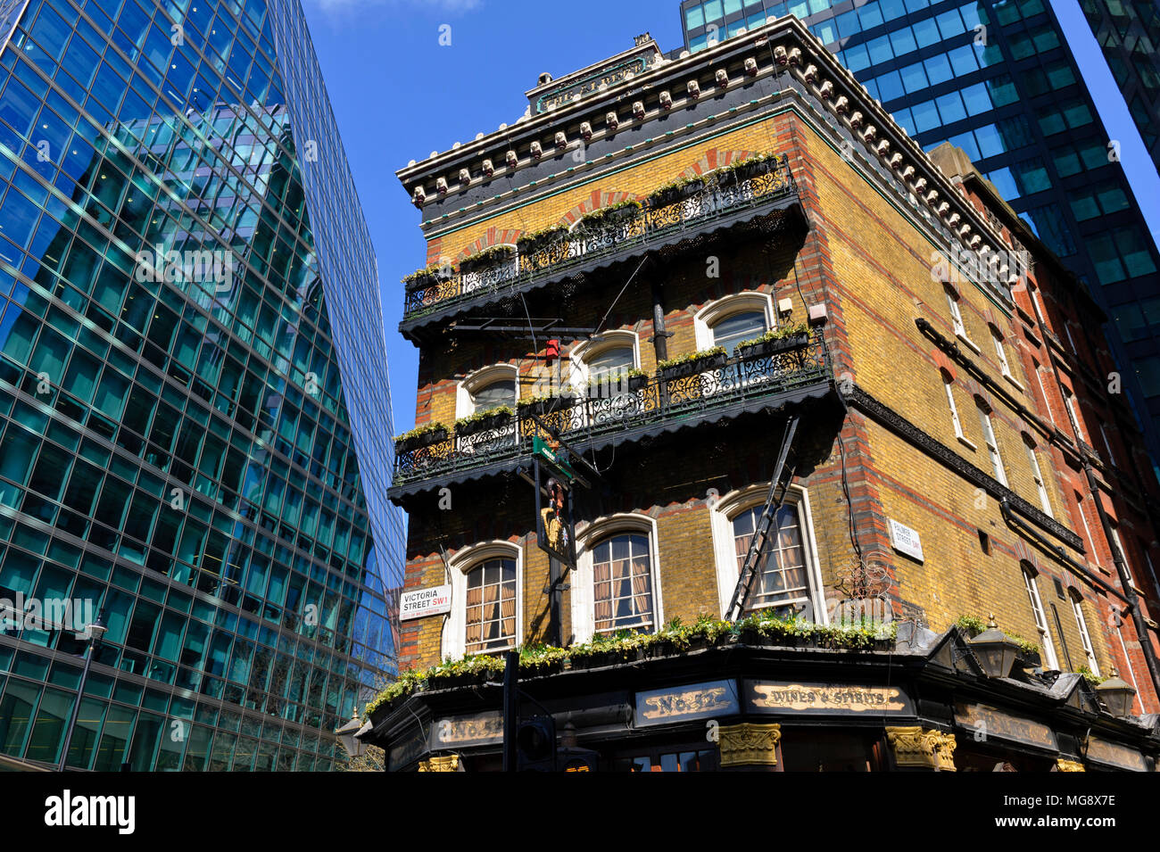 An old British Pub (Albert Pub) by a modern Skyscraper, London, England ...
