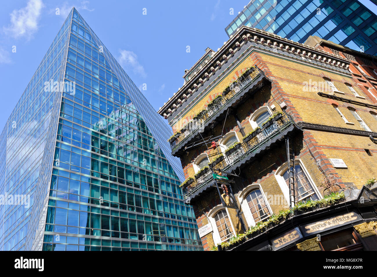 An old British Pub (Albert Pub) by a modern Skyscraper, London, England ...