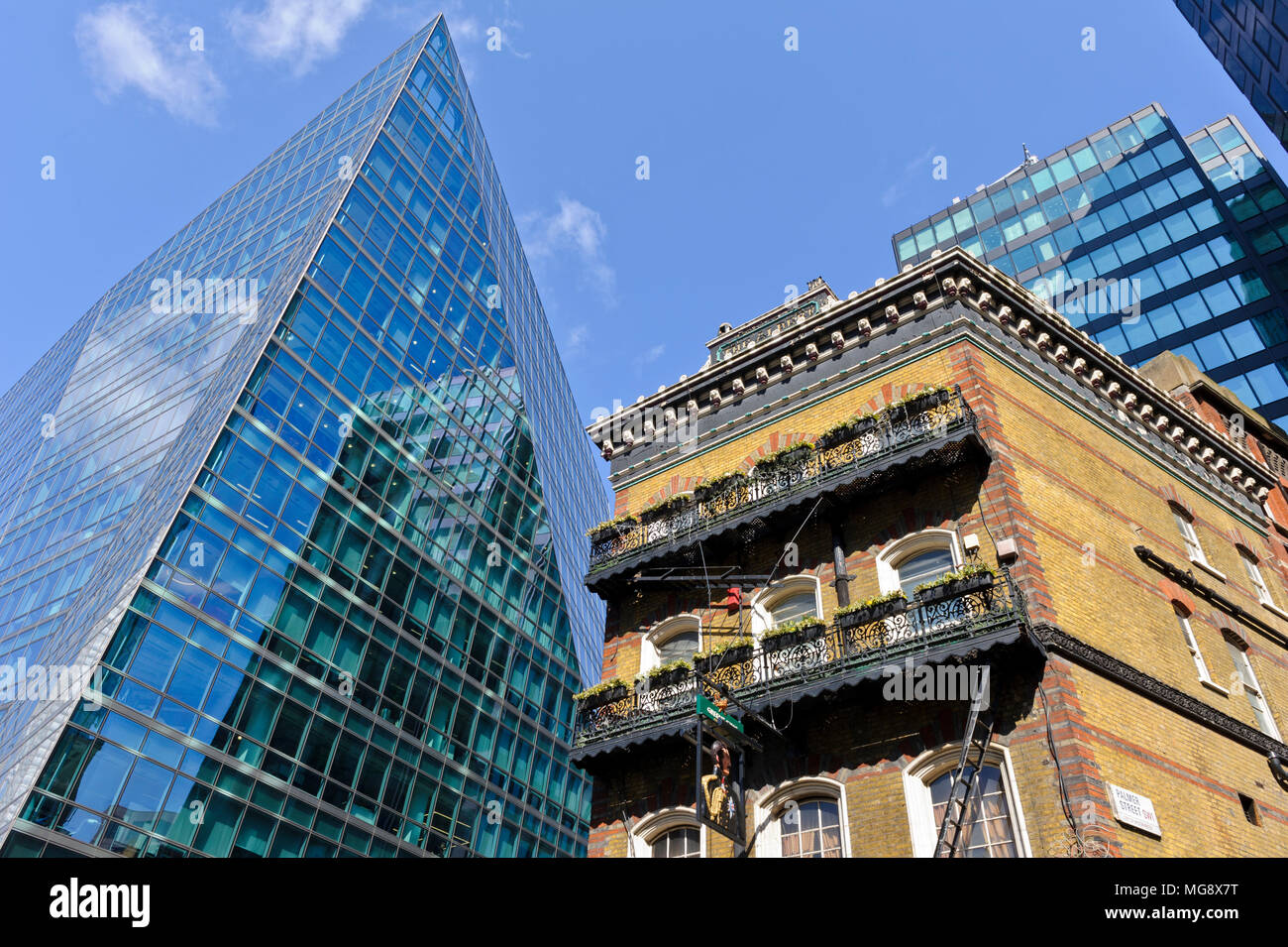 An old British Pub (Albert Pub) by a modern Skyscraper, London, England ...