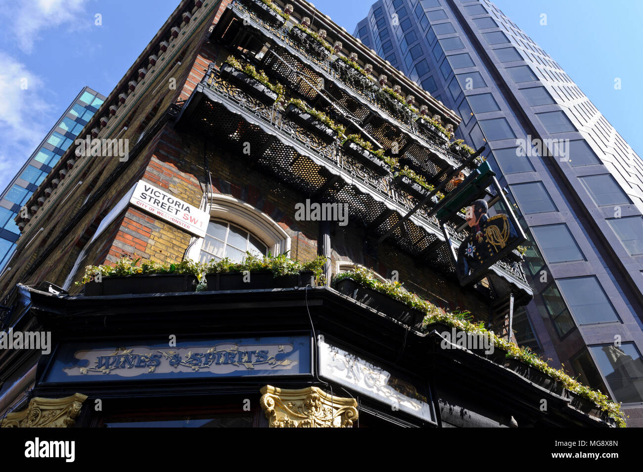 An old British Pub (Albert Pub) by a modern Skyscraper, London, England ...