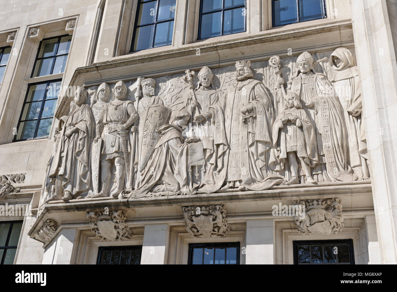 Stone carvings on the exterior wall of the Supreme Court Building ...