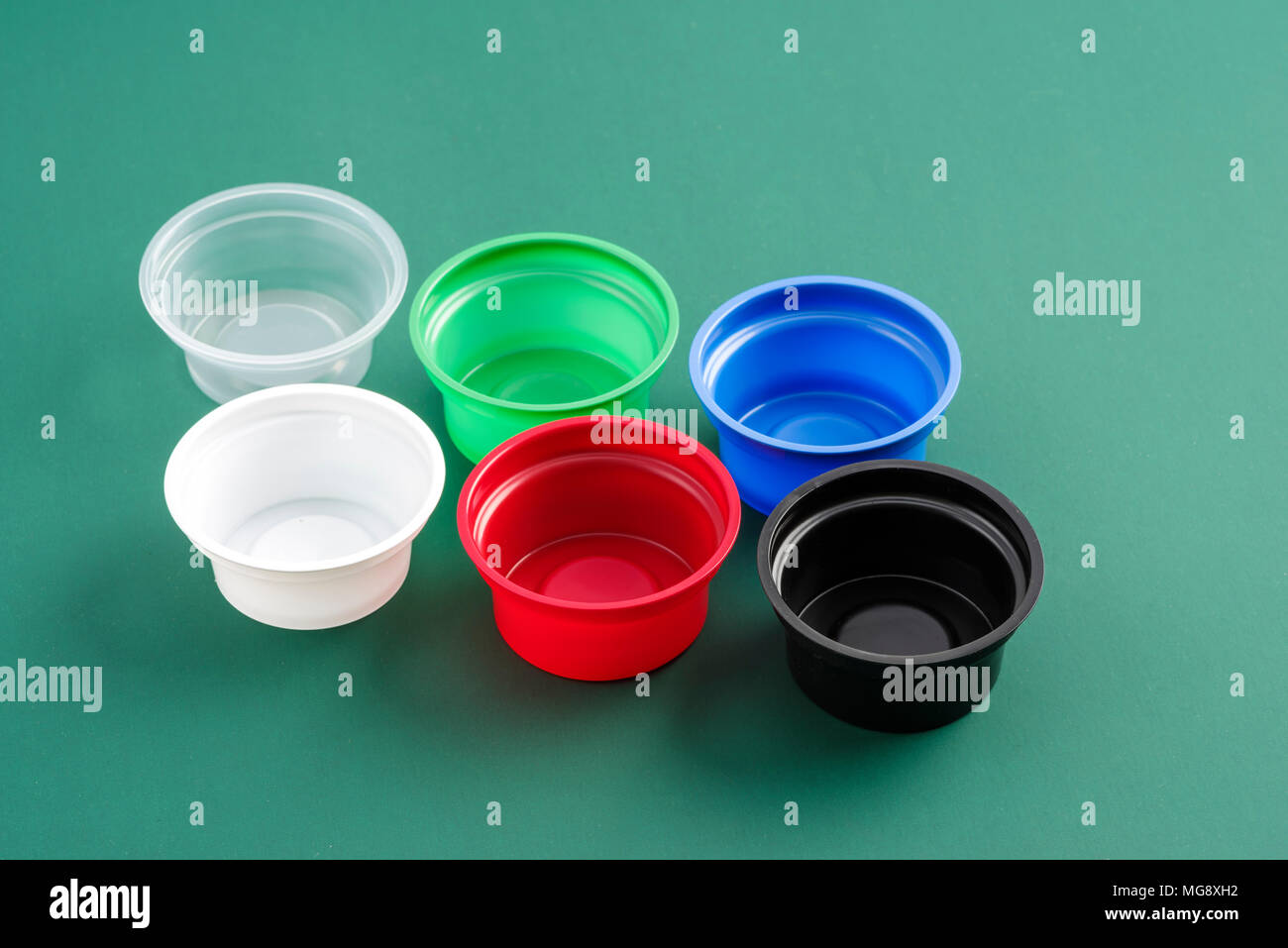 plastic containers for eating different colors Stock Photo - Alamy