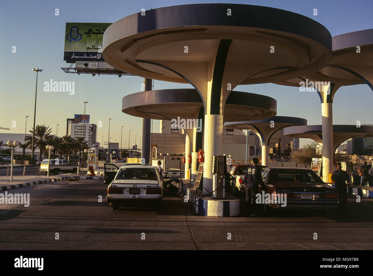 Filling gas at the gas station during the 1990s in Riyadh, Saudi Arabia ...